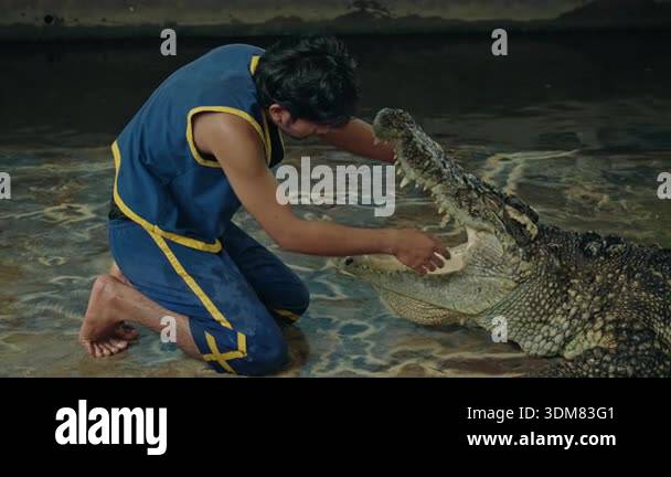 Samui, Thailand, 20 January 2026: Man placing his hands inside open ...