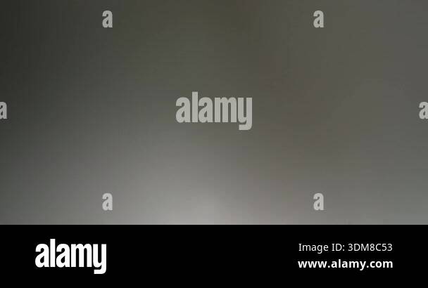 A subtle and soft focus background with blurred light patterns creating ...