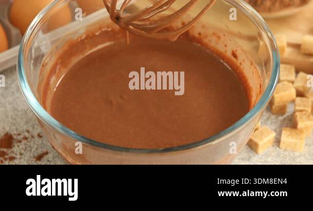 Dripping chocolate dough from whisk Stock Videos & Footage - HD and 4K ...