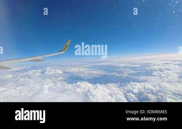 Hyperlapse airplane taking off from runway and rising up through the ...