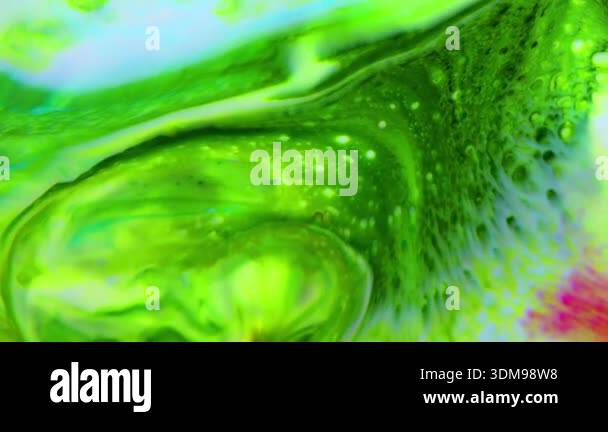A visually rich paint surface formed by flowing colors and layered ...