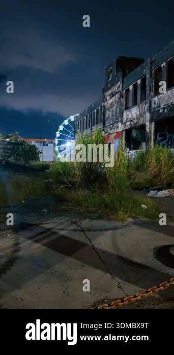 Abandoned building at night carnival. Urban night scene with abandoned ...
