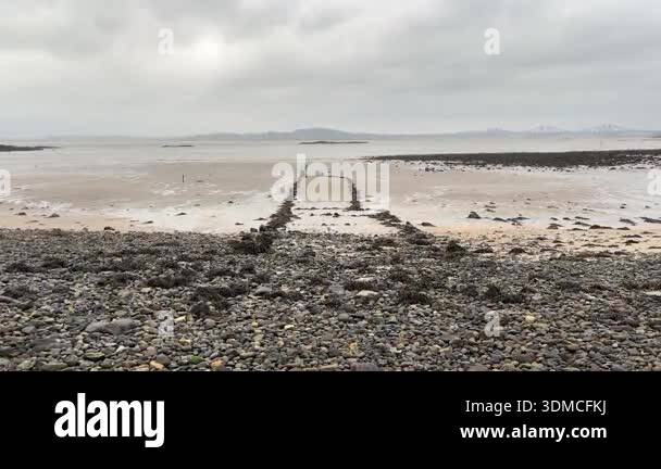 Rugged rocky coastline surrounding Braefoot Bay on Fife coast Scotland ...