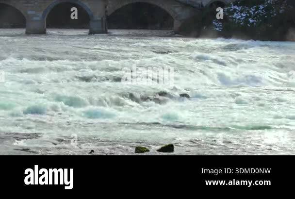 Raging River Rapids Under Stone Bridge, Frothy Turquoise Water Churning ...