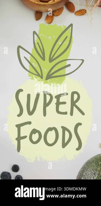 Super foods text animation over various healthy ingredients on white ...