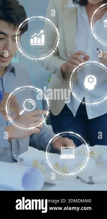 Business professionals collaborating over data processing and ...
