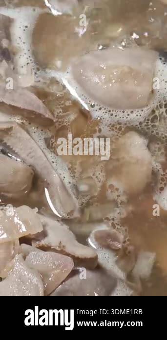 Pork kidneys being cooked in boiling water Stock Video Footage - Alamy