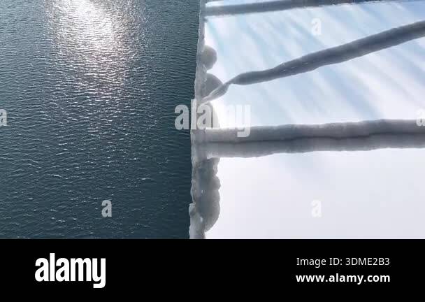 Aerial view of ice edge meeting dark blue water, showcasing gradual ...