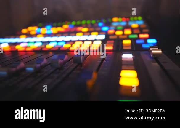 Close up of soundboard or dj remote with moving buttons. Working ...