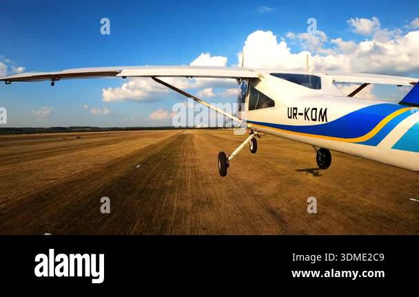 Aircraft in flight, highlighting the wing and landing gear, gliding ...