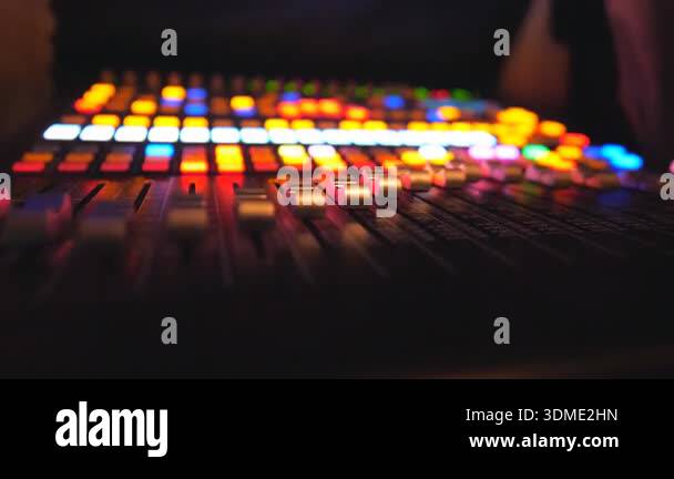 View of moving buttons on dj remote or soundboard. Working process in ...