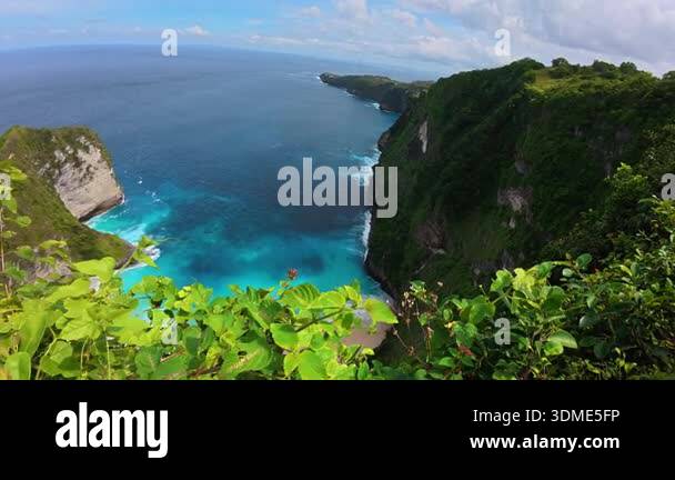 Breathtaking Tilt Down View of Kelingking Beach and T-Rex Cliff in Nusa ...