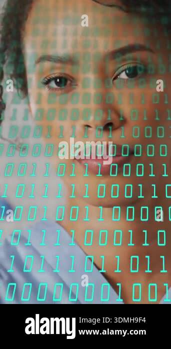 Scientist holding test tube with binary coding over laboratory ...