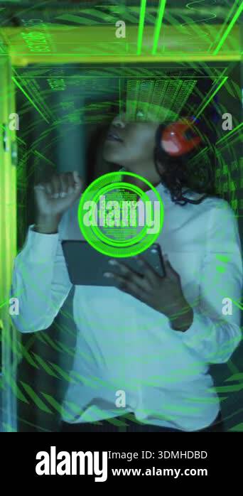 Using tablet with green digital data animation overlay in school ...