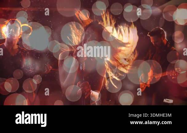 Music lighting fading in sparking singer flipping hair singing guitar ...