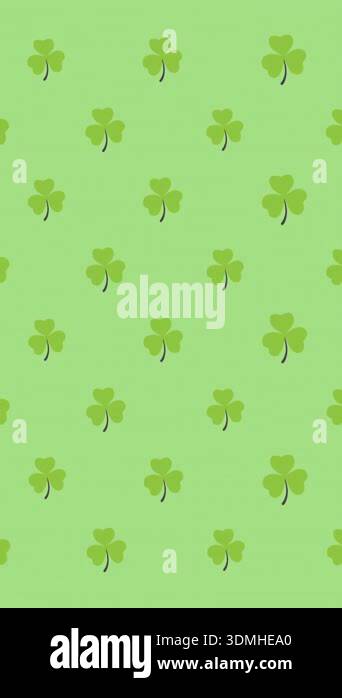 Digital animation of multiple clover leaves moving against green ...