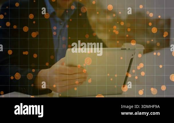 Man placing tablet on desk and tapping screen for business analysis ...