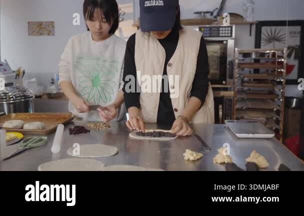 Two skilled female bakers Stock Videos & Footage - HD and 4K Video ...