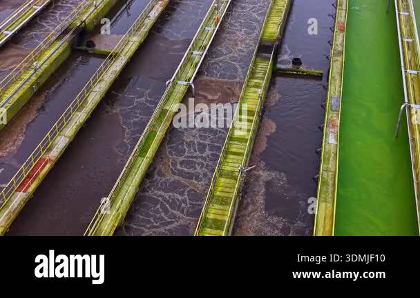 Visual shows a wastewater treatment facility with several channels ...