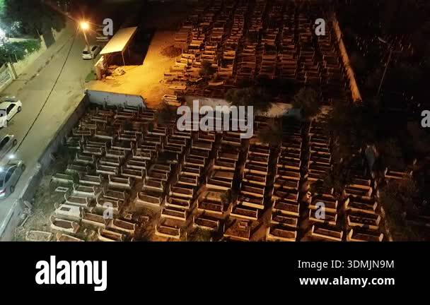 Aerial image showing the dense alignment of graves in Jenin cemetery ...