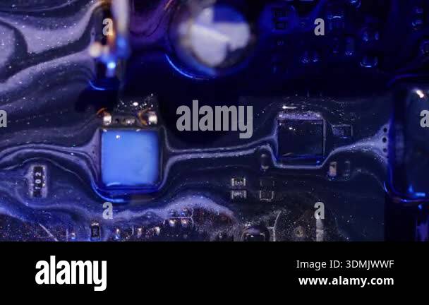 Paint drip. Processor chip. Defocused blue white color digital ...