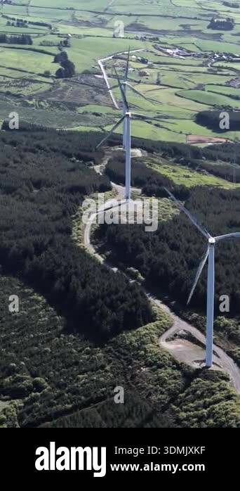 High angle of renewable energy landscape with wind turbines spinning ...