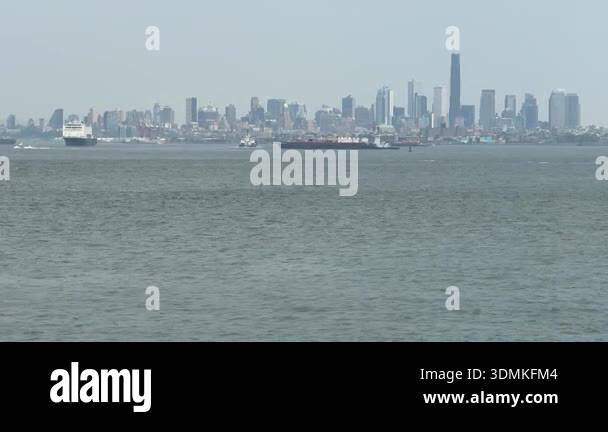 The New York City Skyline Stretches Across The Horizon Behind Cargo