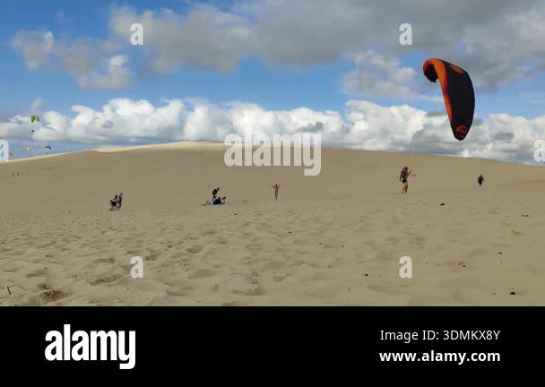 Dune of Pilat, France: People paragliding at the Great Dune of Pilat ...