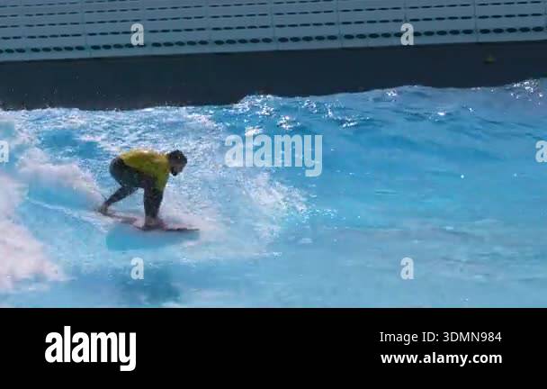 ALAIA BAY WAVEGARDEN, SION, SWITZERLAND, SEP 6th 2024: Male surfer ...