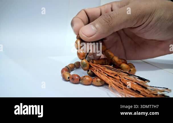 Hand Holding Wooden Tasbih Prayer Beads for Dhikr Close Up Video ...