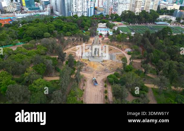 Drone video of Campo de Marte park surrounded by Lima city, Jesus Maria ...