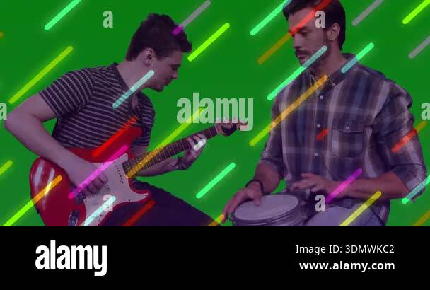 Guitarist initiating strum and drummer matching rhythm under neon ...