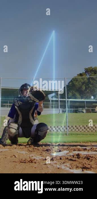 Baseball player preparing to bat with catcher crouching behind home ...