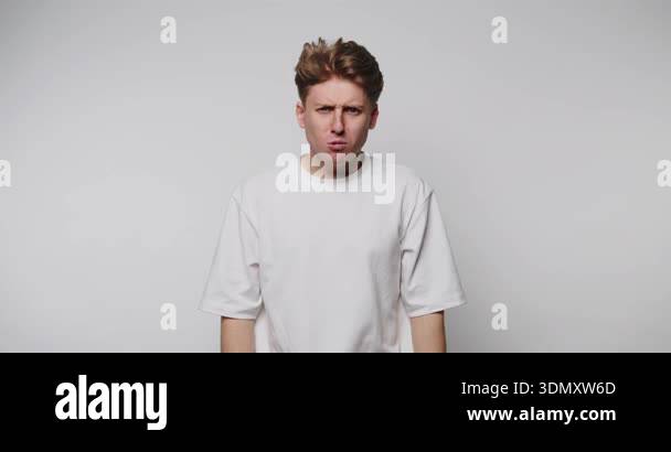 A person displays four unique emotions in a plain setting. Each frame ...