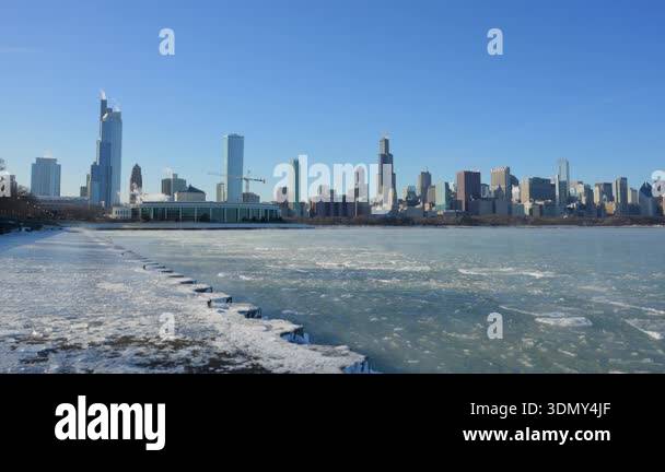Chicago skyline with frozen Lake Michigan and ice formations, winter ...