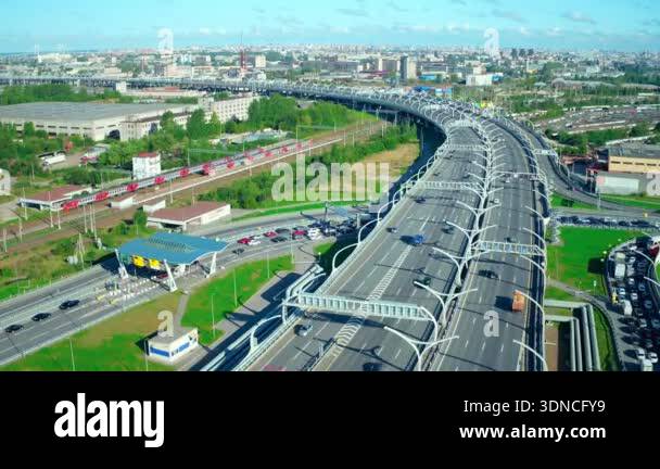 Car driving on urban highway intersection and tol road in developed ...