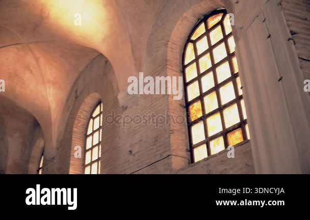Ancient architecture building. Stained glass windows, stucco molding ...