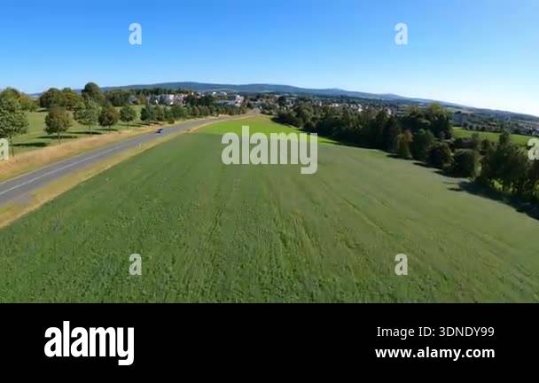 Dynamic FPV flight over field in Germany Stock Video Footage - Alamy