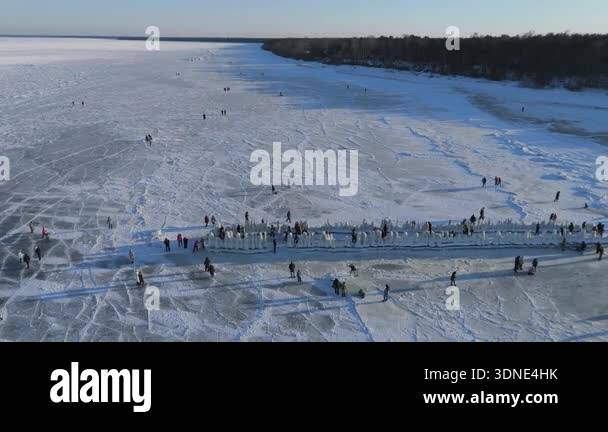 Drone Video Of Frozen Baltic Sea At Beach With Ice Covered Old Wooden ...
