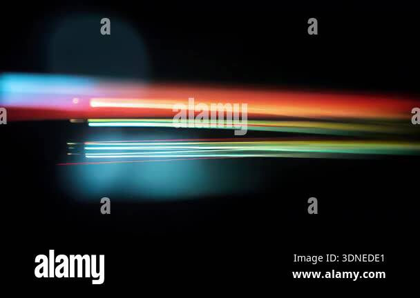Horizontal multicolor light trails with chromatic glow, red yellow blue ...