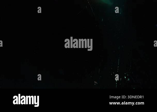 Dark analog background with subtle green light leak, deep shadows, fine ...