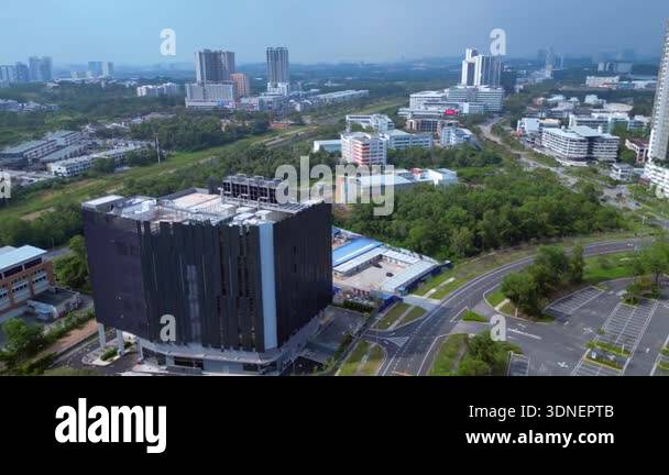 Aerial view modern buildings Cyberjaya city , roads, and ongoing ...