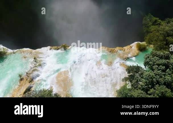 Cascada de Tamul shows powerful water dropping from a high cliff ...