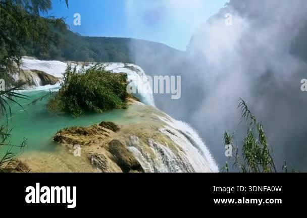 Cascada de Tamul shows powerful water dropping from a high cliff ...