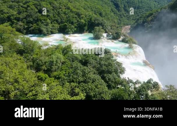 Cascada de Tamul shows powerful water dropping from a high cliff ...