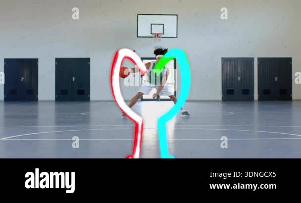 Basketball player dribbling at free-throw line, sparking neon light ...