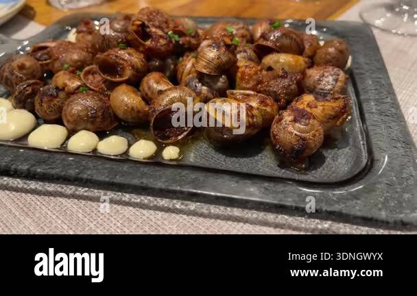 Cooked Snails in Sauce Traditional Spanish Dish Stock Video Footage - Alamy