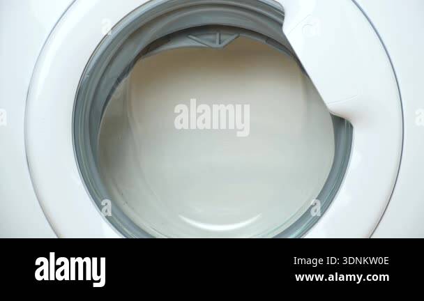 The washing machine works in spin mode, fast rotation of the drum in ...