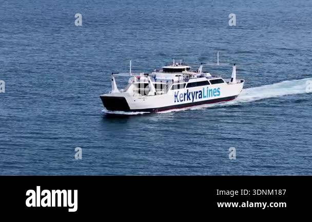Close up aerial tracking shot of the Ano Hora II passenger ferry boat ...