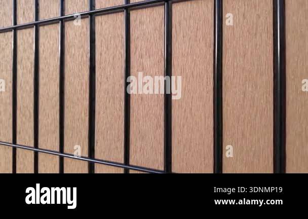 Slow panning shot showing the texture of WPC composite wood slat ...